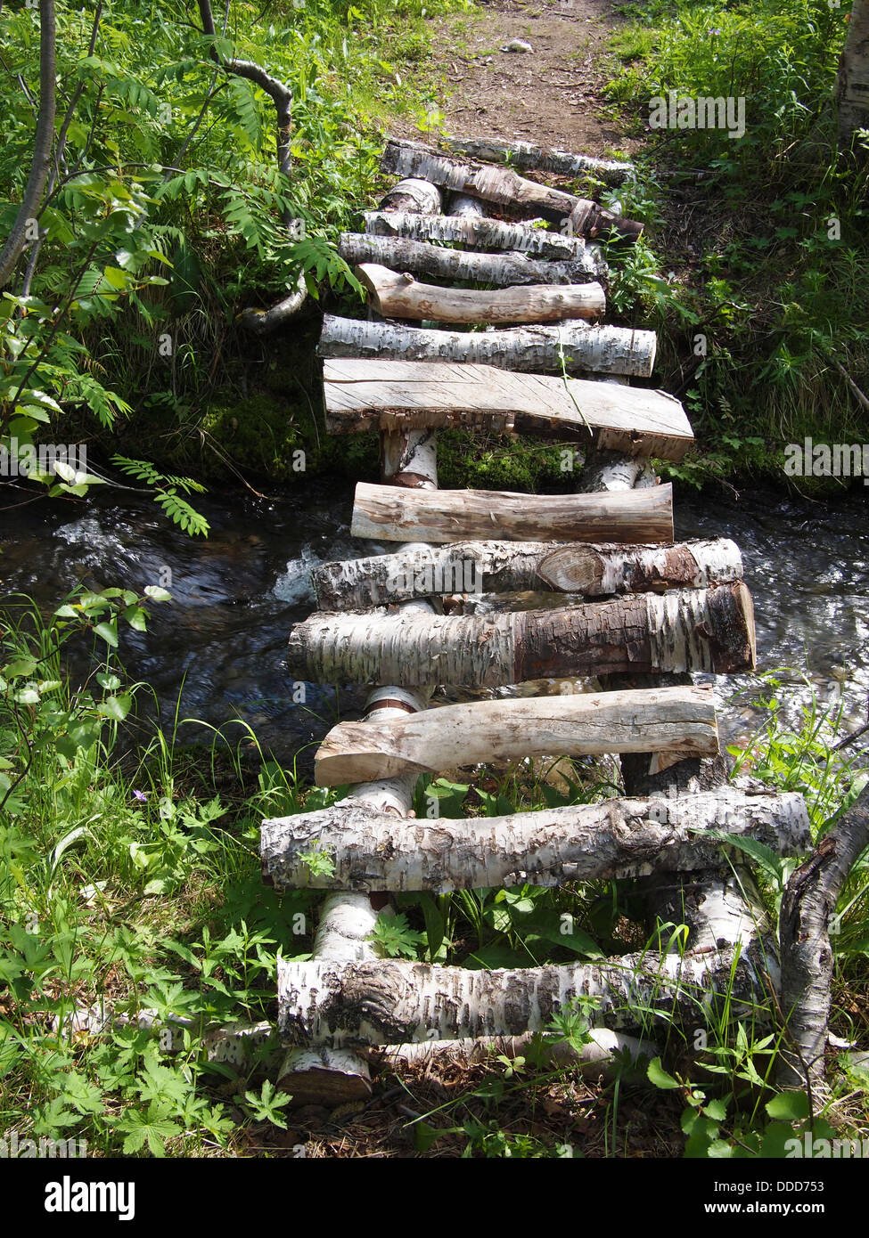 Wood bridge stream current hi-res stock photography and images - Alamy