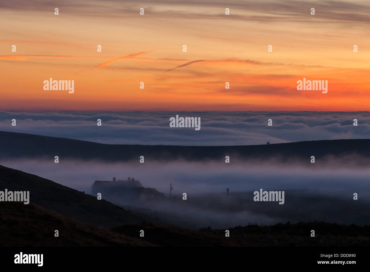Sea of mist rolling in Stock Photo - Alamy
