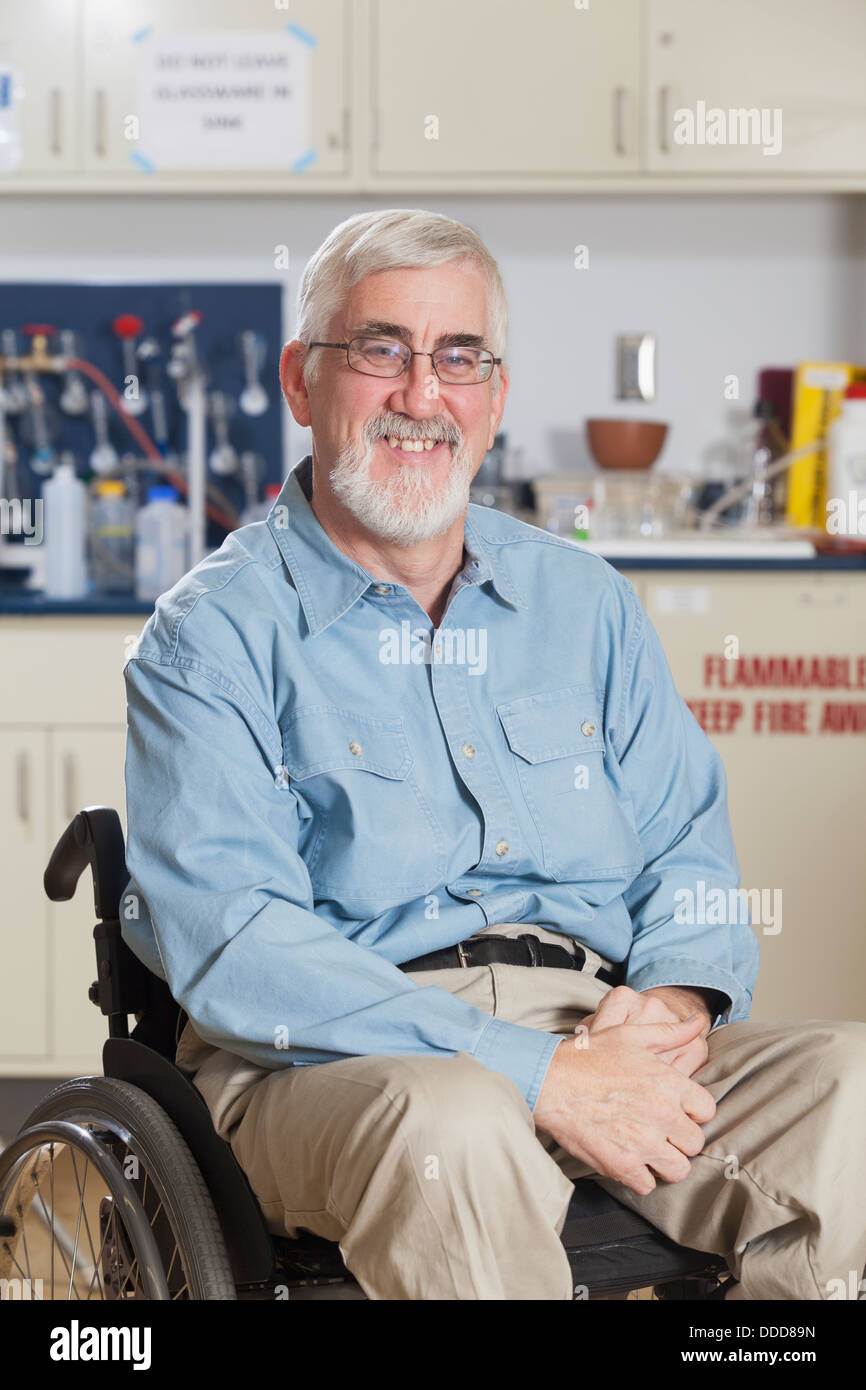 Portrait of an engineering professor in a wheelchair with Muscular ...