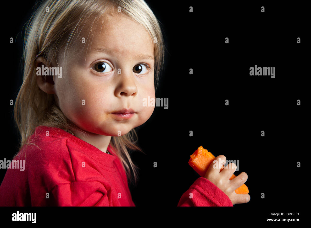 Child healthy eating carrot hi-res stock photography and images - Alamy