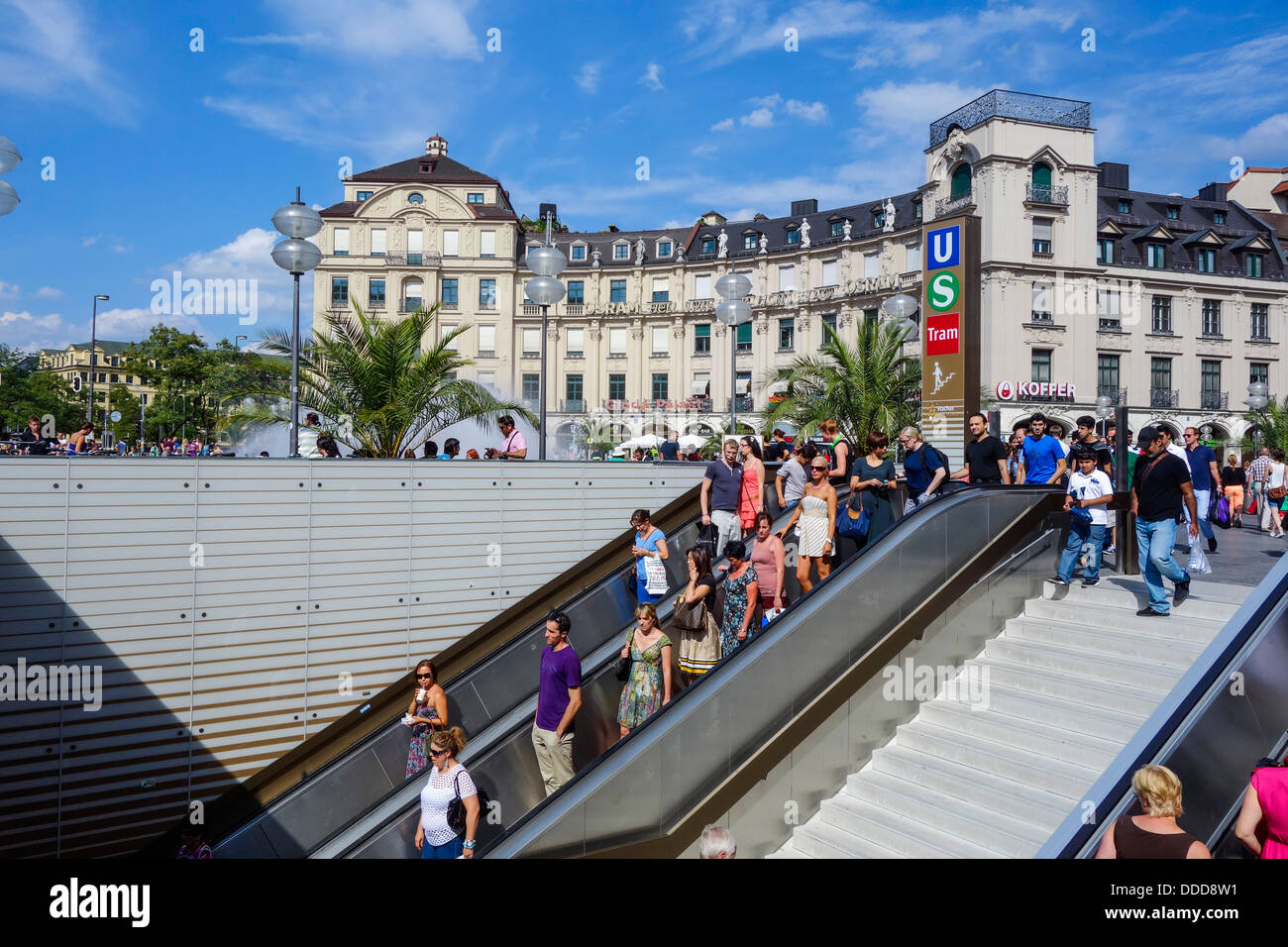 Escalator with passers-by on Karlsplatz, Stachus, in Munich, Bavaria ...