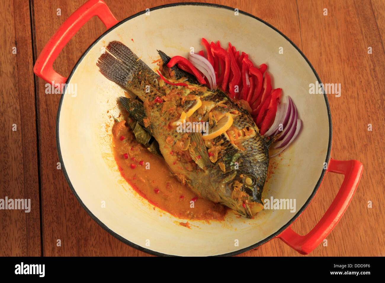 Braised fish with fish hi-res stock photography and images - Alamy