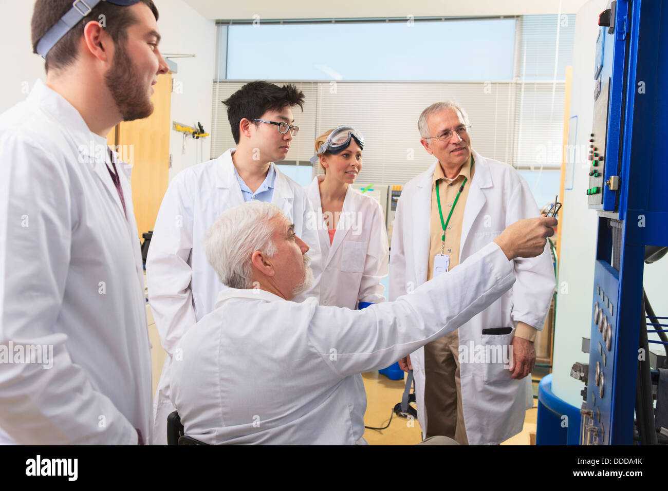 Professors explaining operation of water ultra purification system to ...