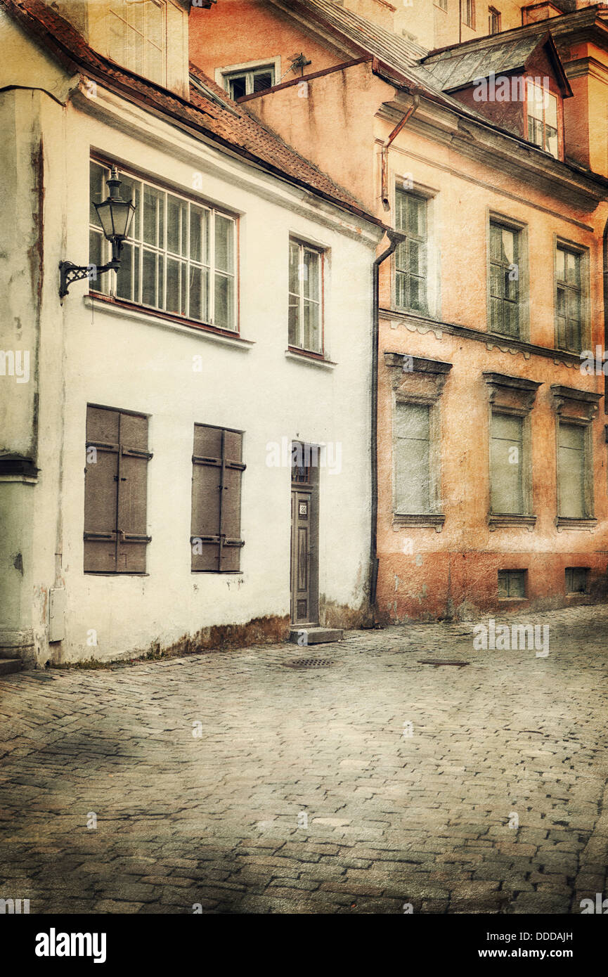 Retro style image of old european street Stock Photo - Alamy
