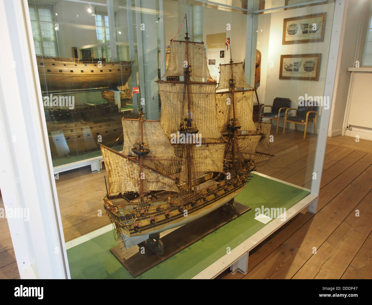 A detailed model of a ship on display at the Royal Danish Naval Museum ...