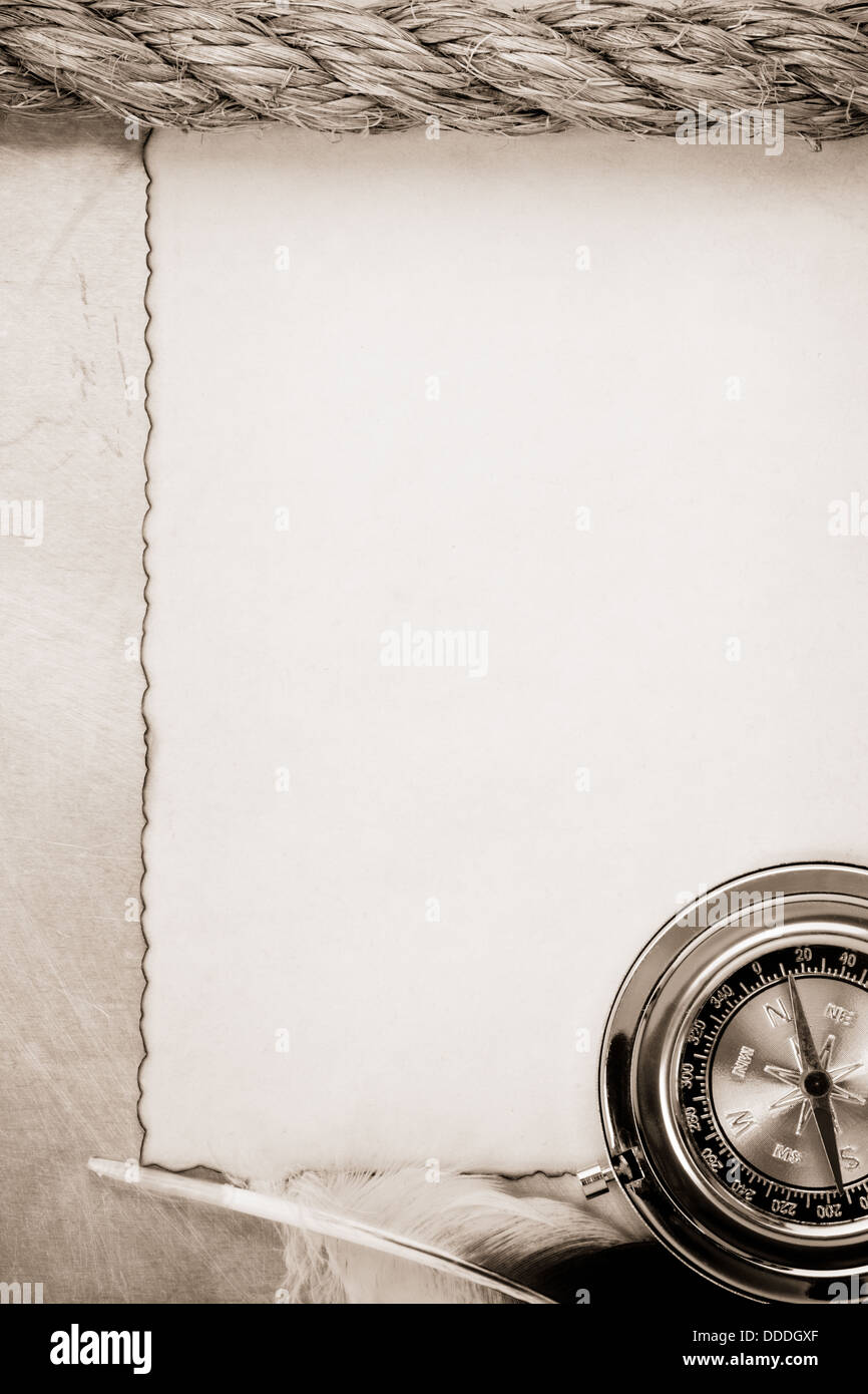 parchment and compass with ship rope Stock Photo - Alamy
