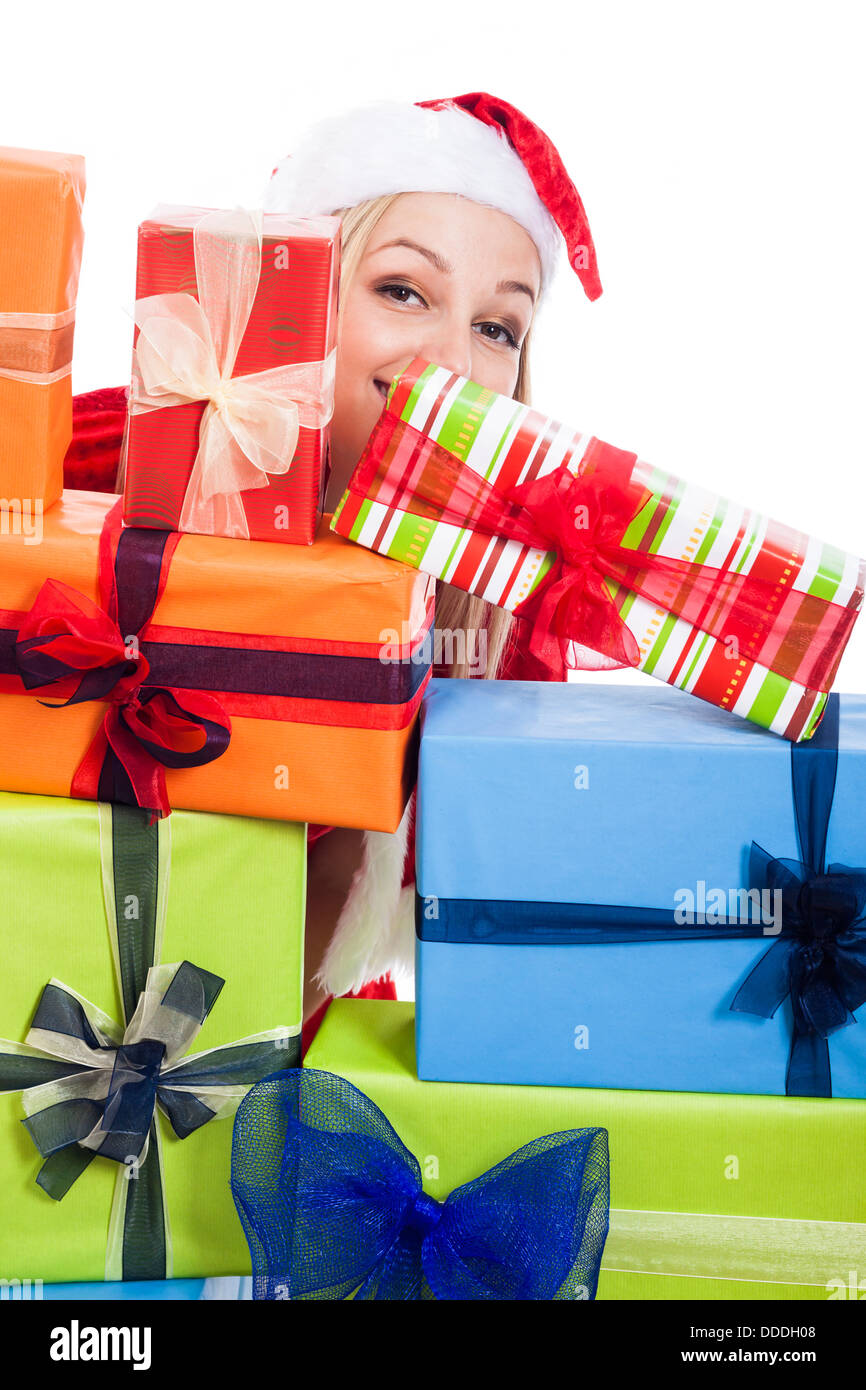 Christmas woman hiding behind many presents, isolated on white ...