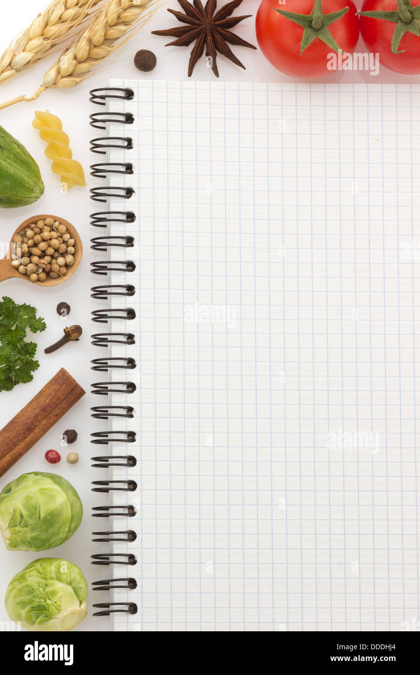 food ingredients and recipe book on white background Stock Photo - Alamy