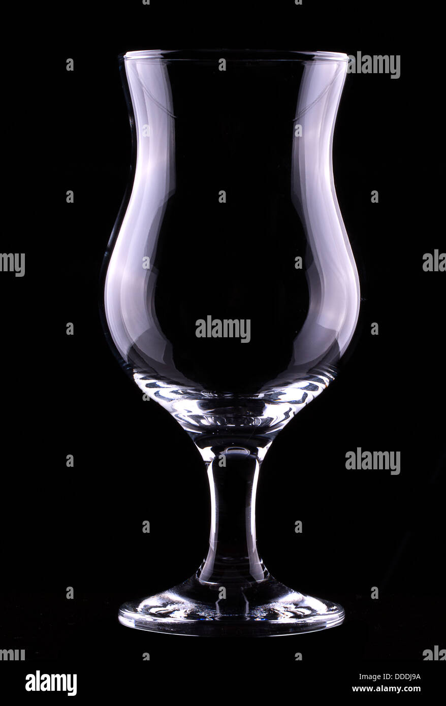 empty glass isolated on a black background Stock Photo - Alamy