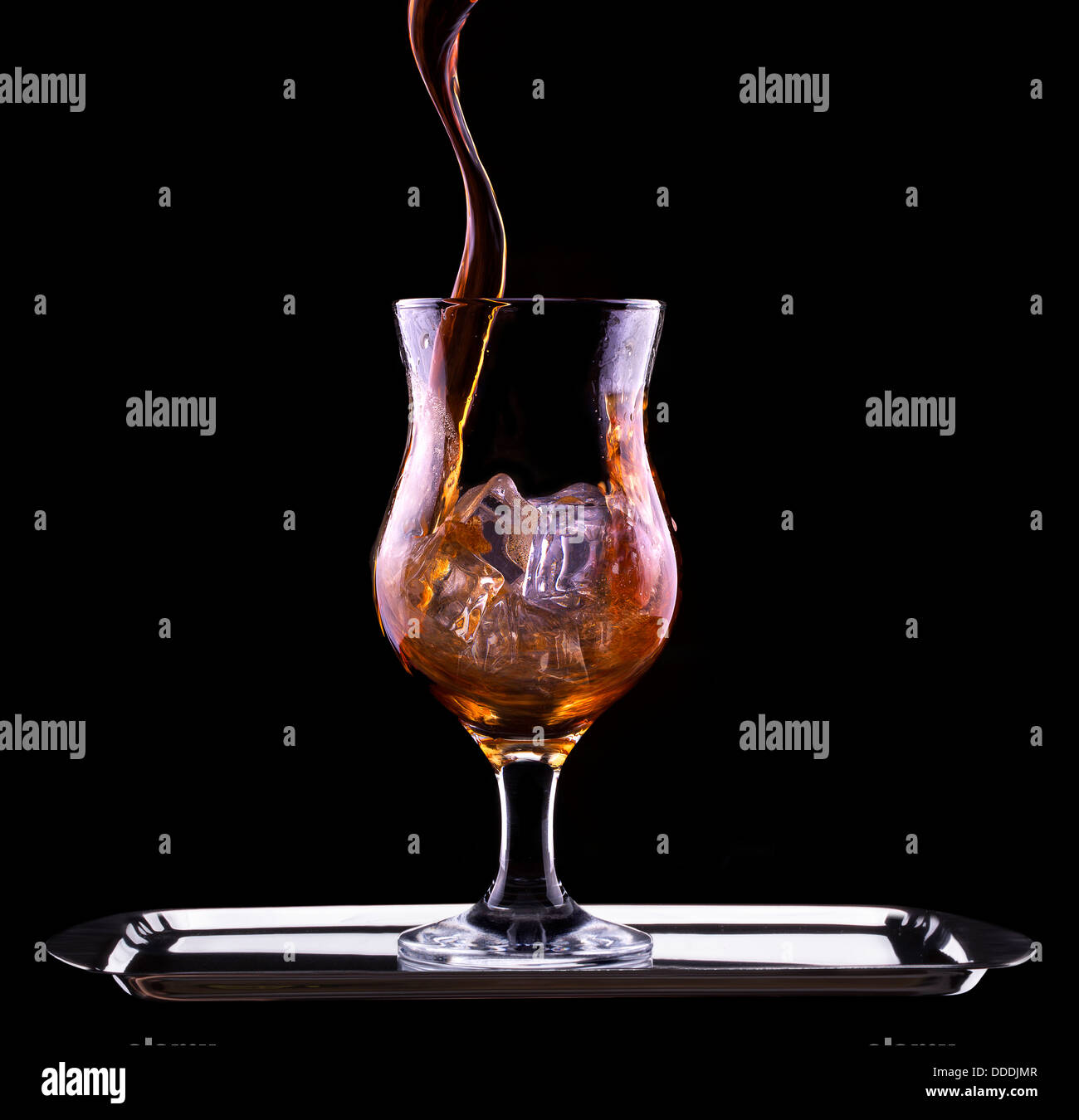 Fresh cola drink background with splash isolated on a black Stock Photo ...