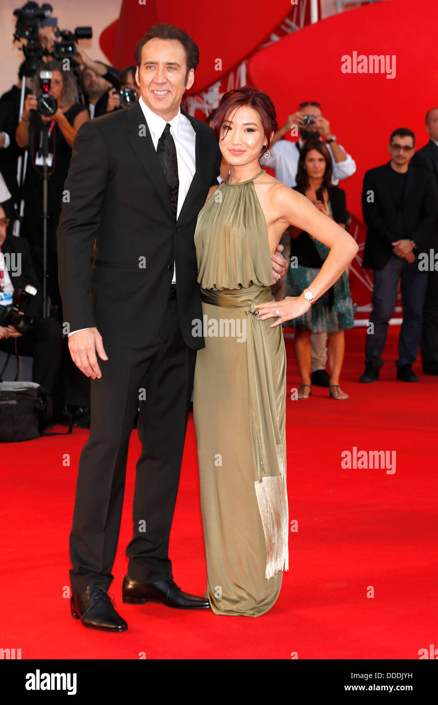 Venice, Italy. 30th August 2013. Nicolas Cage and wife Alice Kim ...