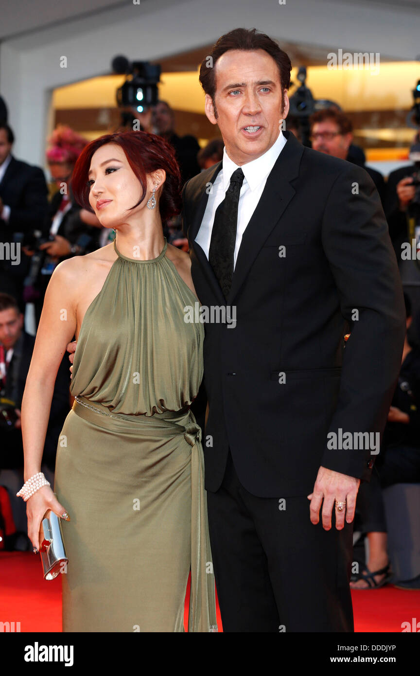 Venice, Italy. 30th August 2013. Nicolas Cage and wife Alice Kim ...