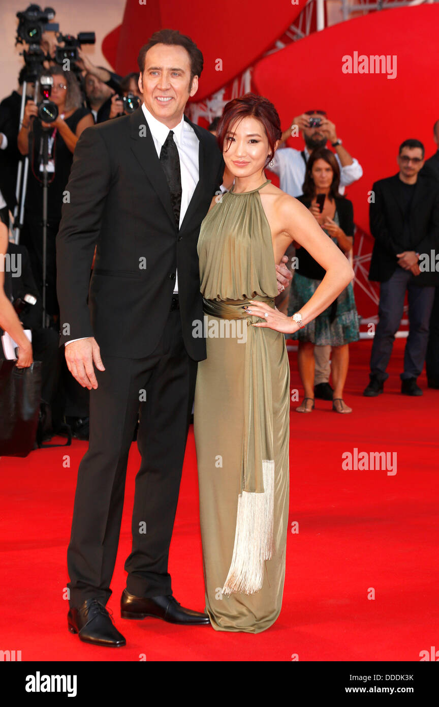 Venice, Italy. 30th August 2013. Nicolas Cage and wife Alice Kim ...