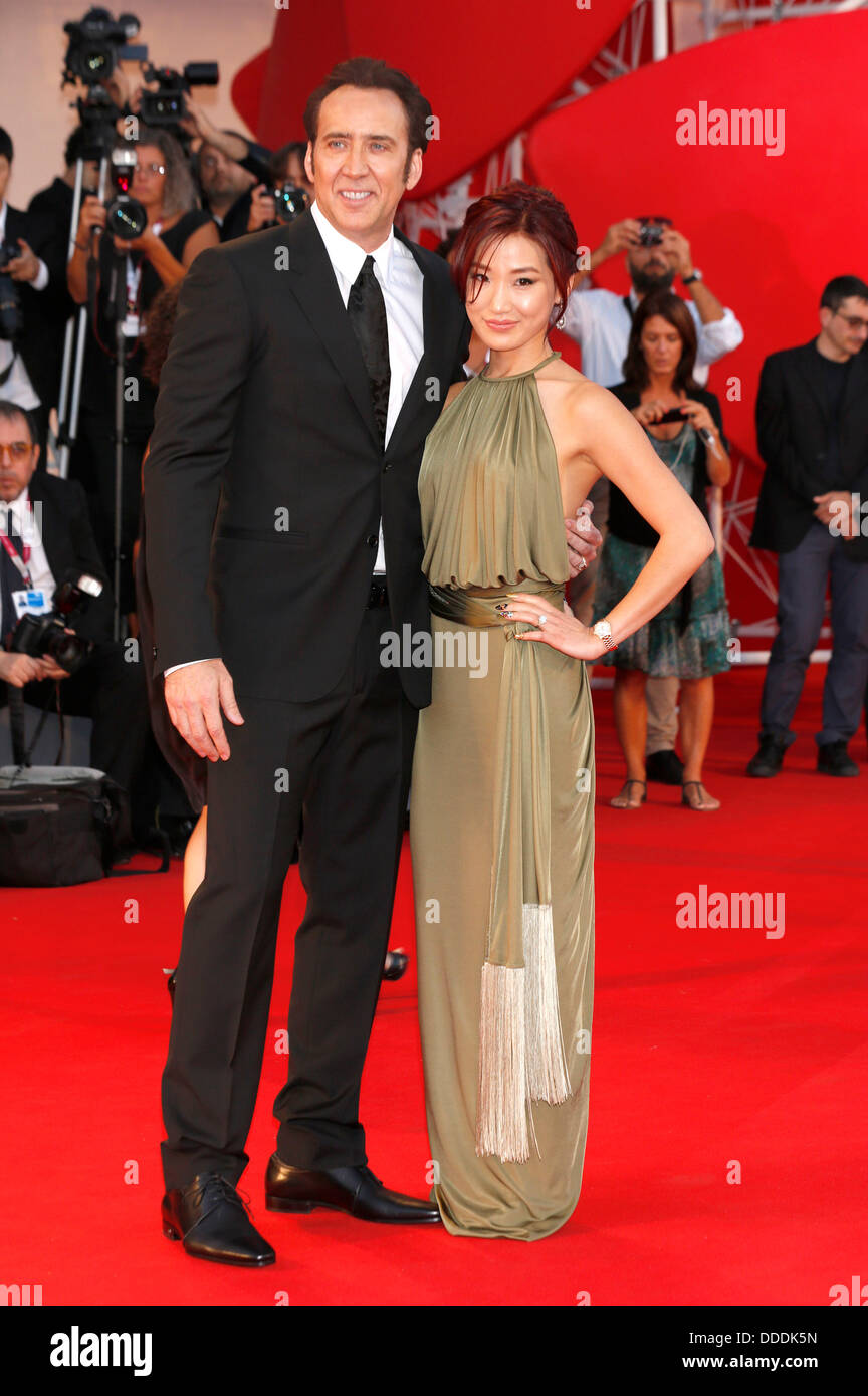 Venice, Italy. 30th August 2013. Nicolas Cage and wife Alice Kim attending the 'Joe' premiere at ...