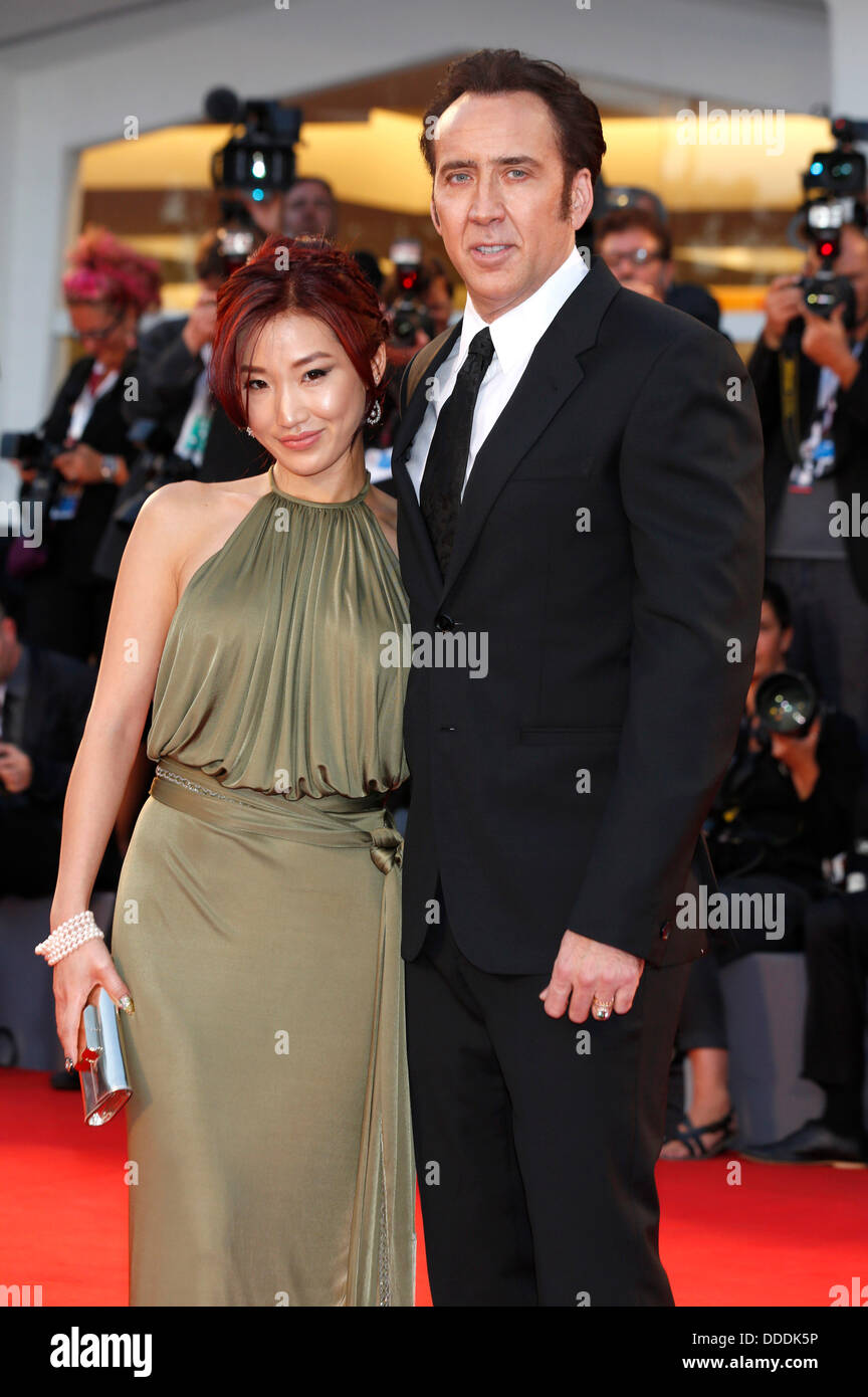 Venice, Italy. 30th August 2013. Nicolas Cage and wife Alice Kim ...