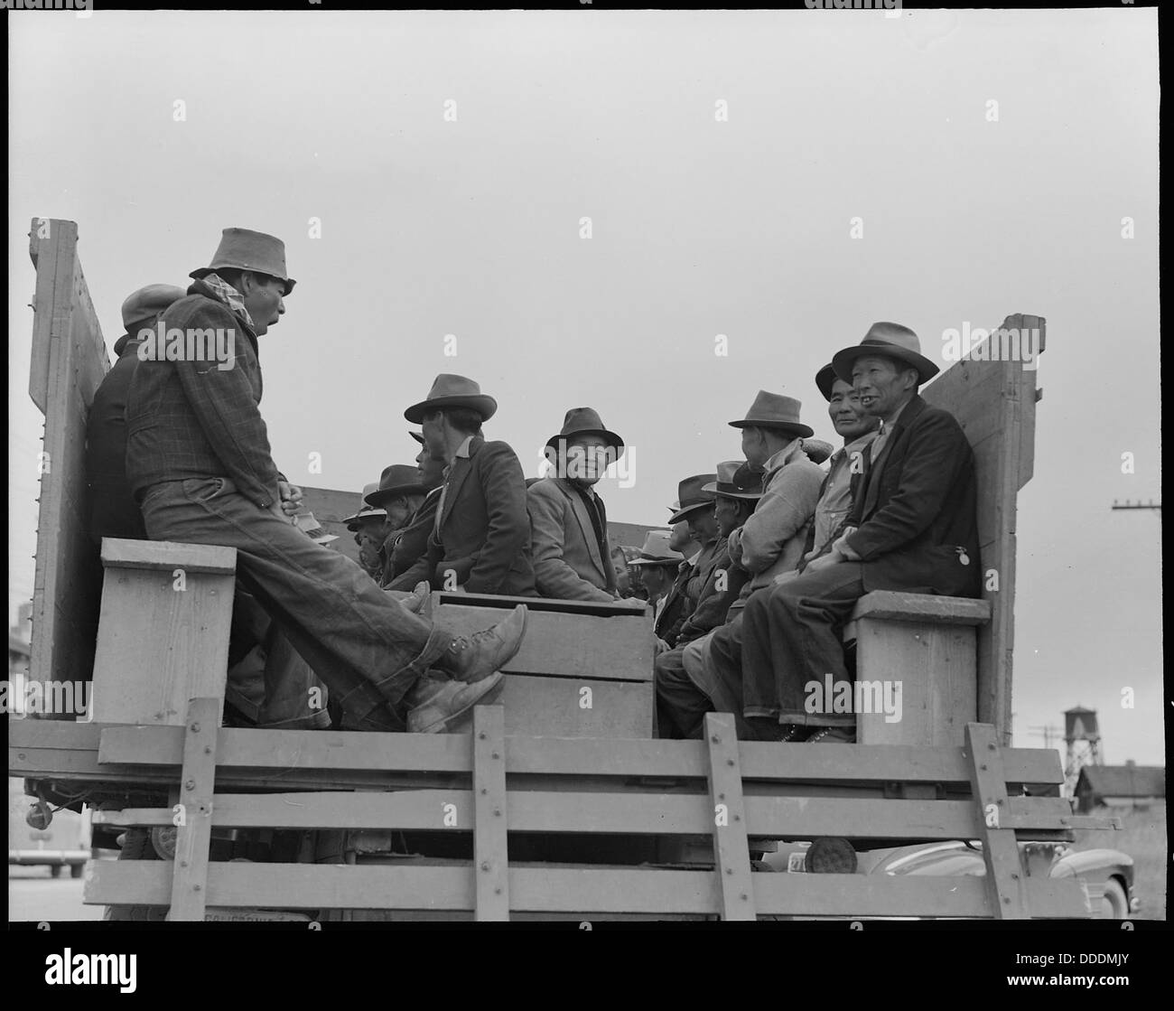 Field laborers of Japanese ancestry are shown returning to large-scale ...