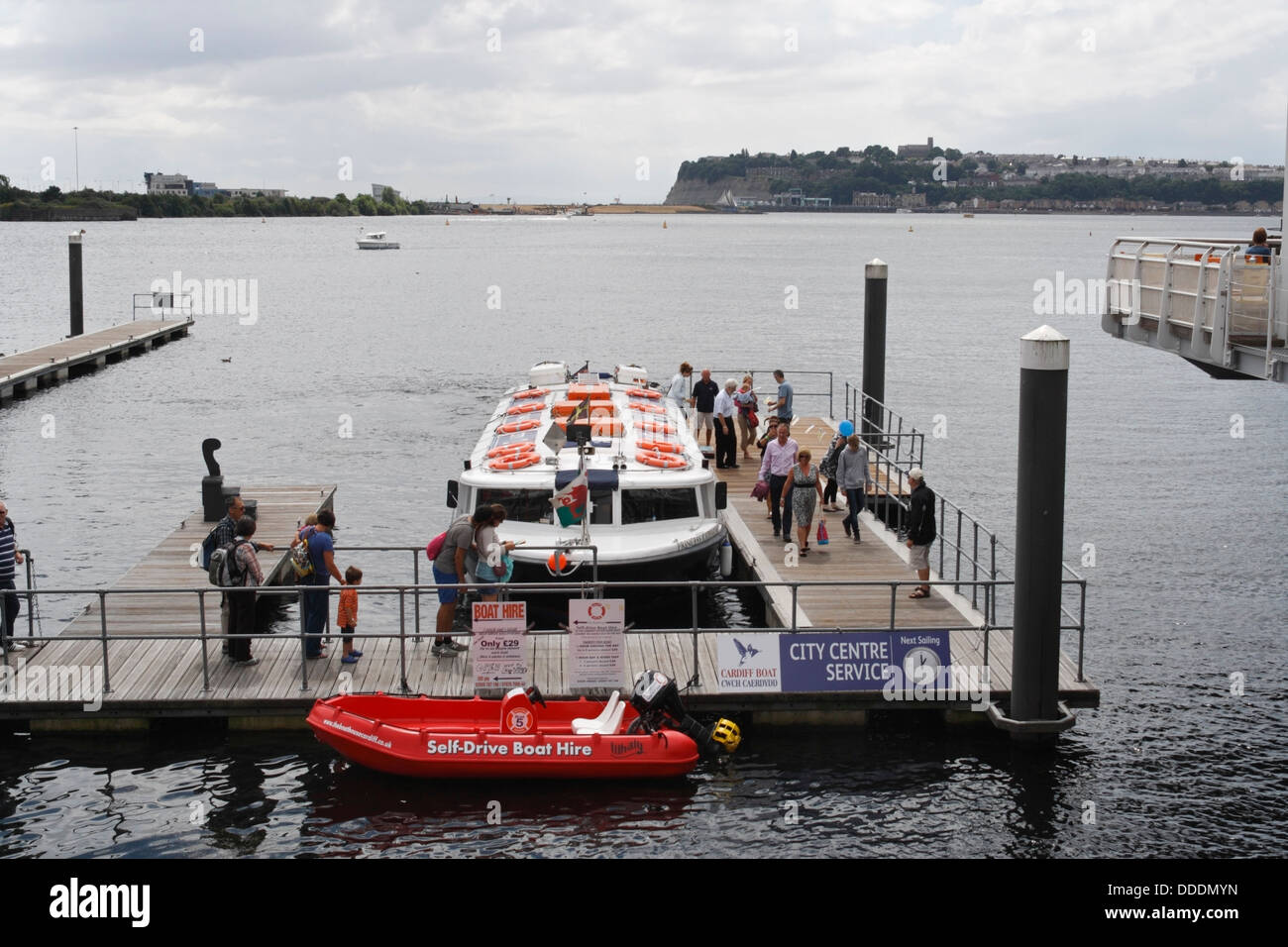 Passengers getting off a water bus in Cardiff Bay Stock Photo - Alamy