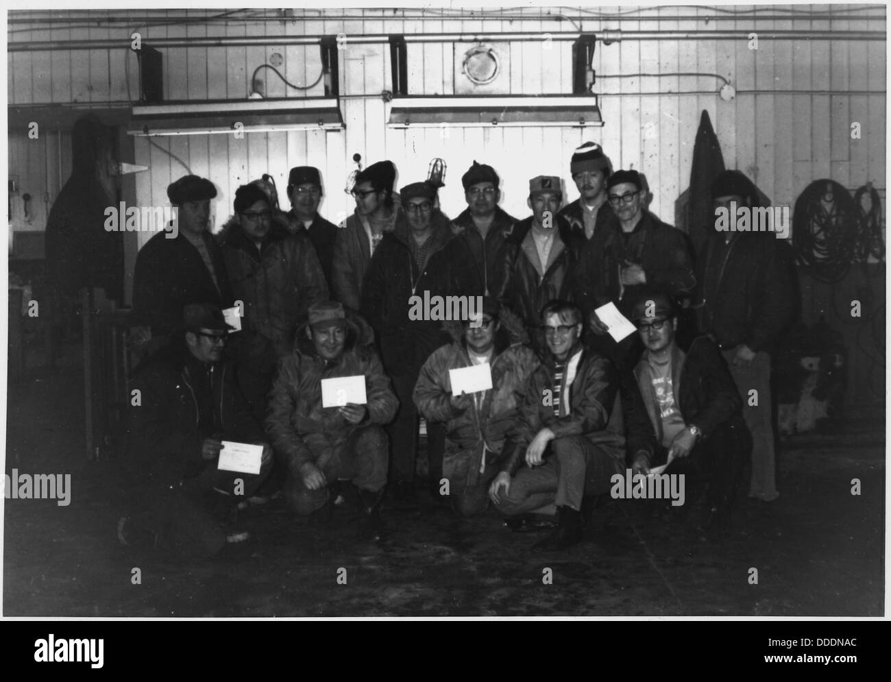 This photograph features individuals receiving their diesel engine ...