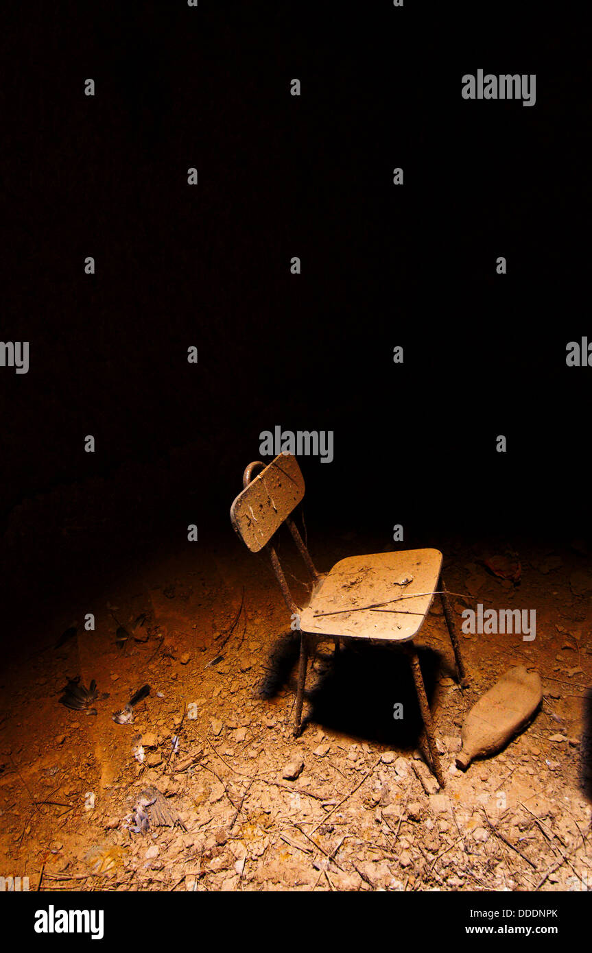 Chair at abandoned underground cellar where the roof collapsed Stock ...