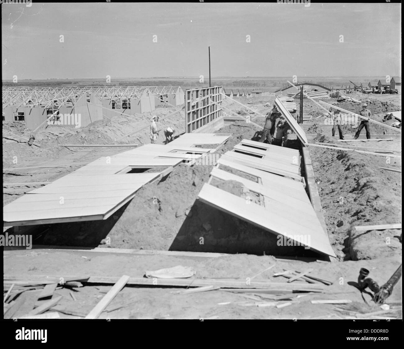 A photograph showing the construction of barracks at the Granada ...