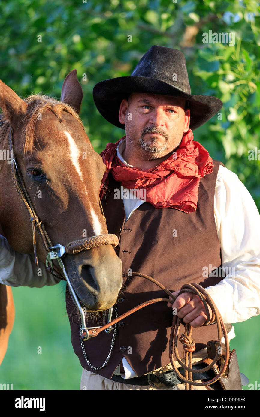 Cowboy Leading A Horse High Resolution Stock Photography and Images - Alamy