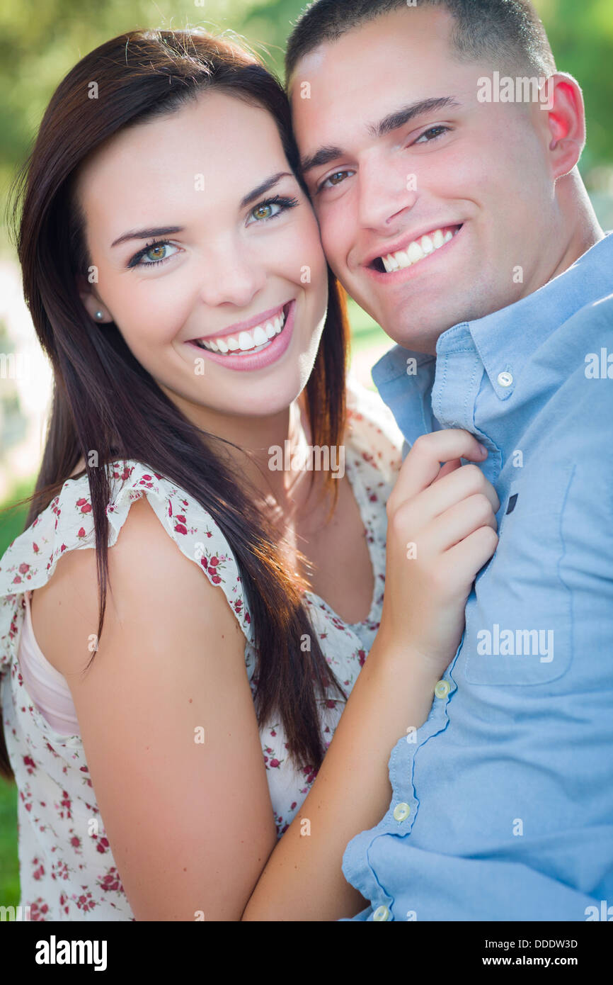 Happy Mixed Race Romantic Couple Portrait in the Park Stock Photo - Alamy