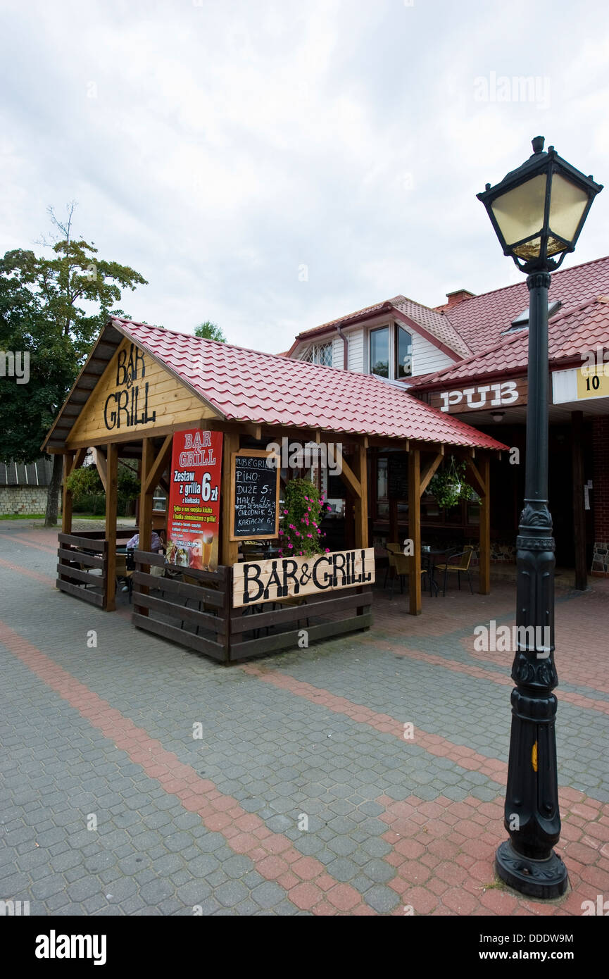 A bar and pub with a veranda Stock Photo - Alamy