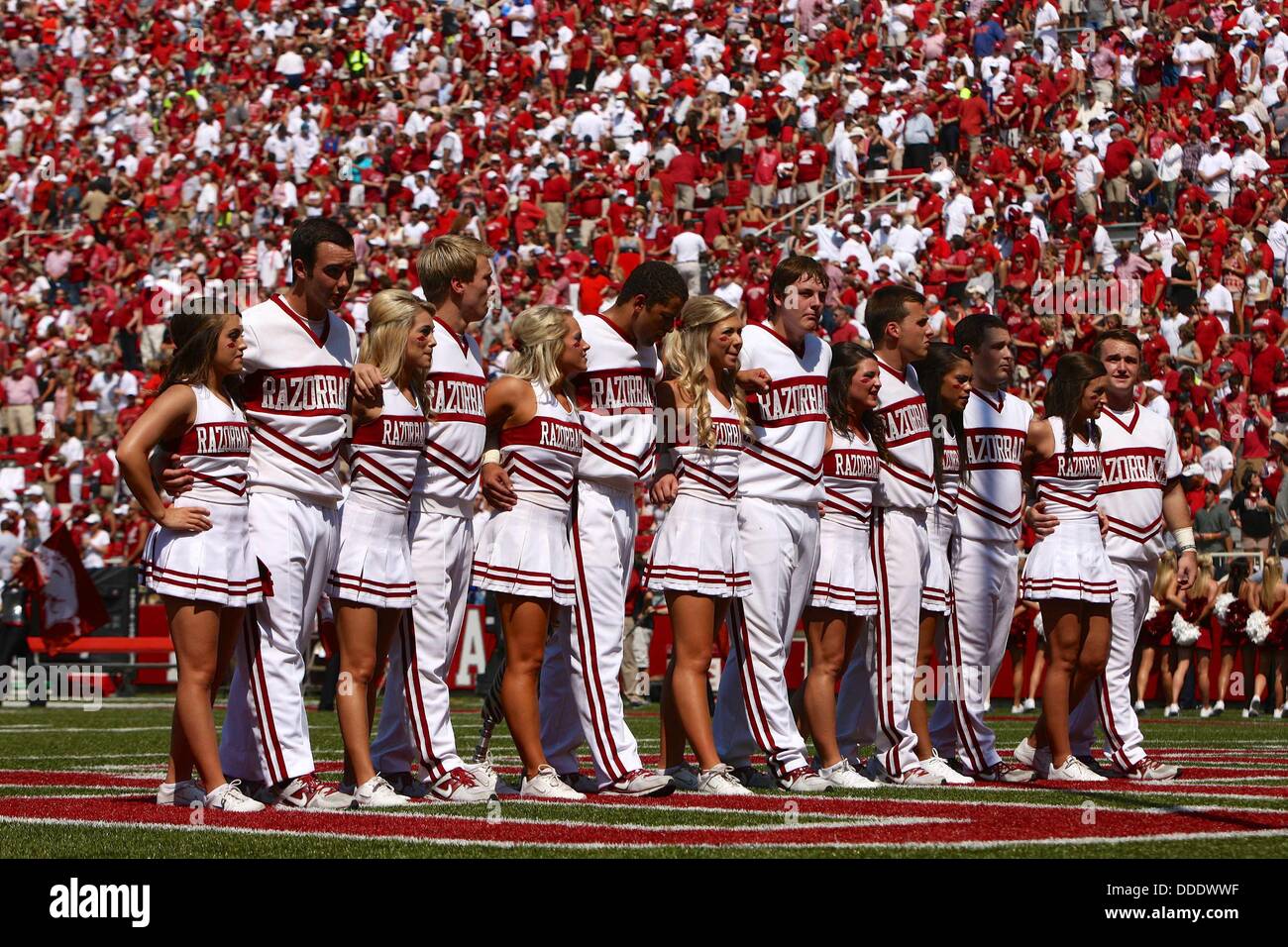 Aug 31, 2013: Members of the Razorback spirit team line up to sign the ...