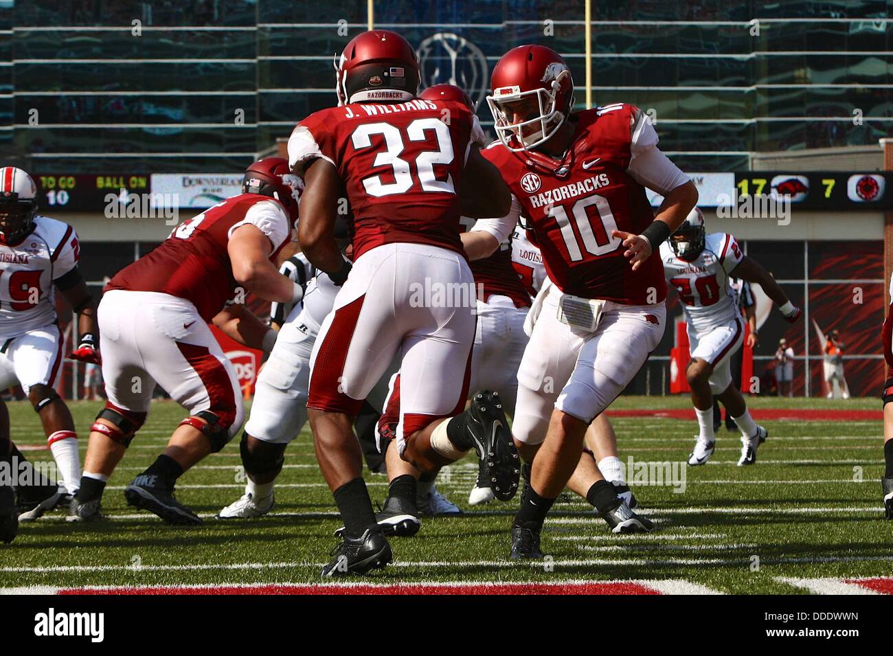 Aug 31, 2013: Razorback QB Brandon Allen #10 places the ball in the ...