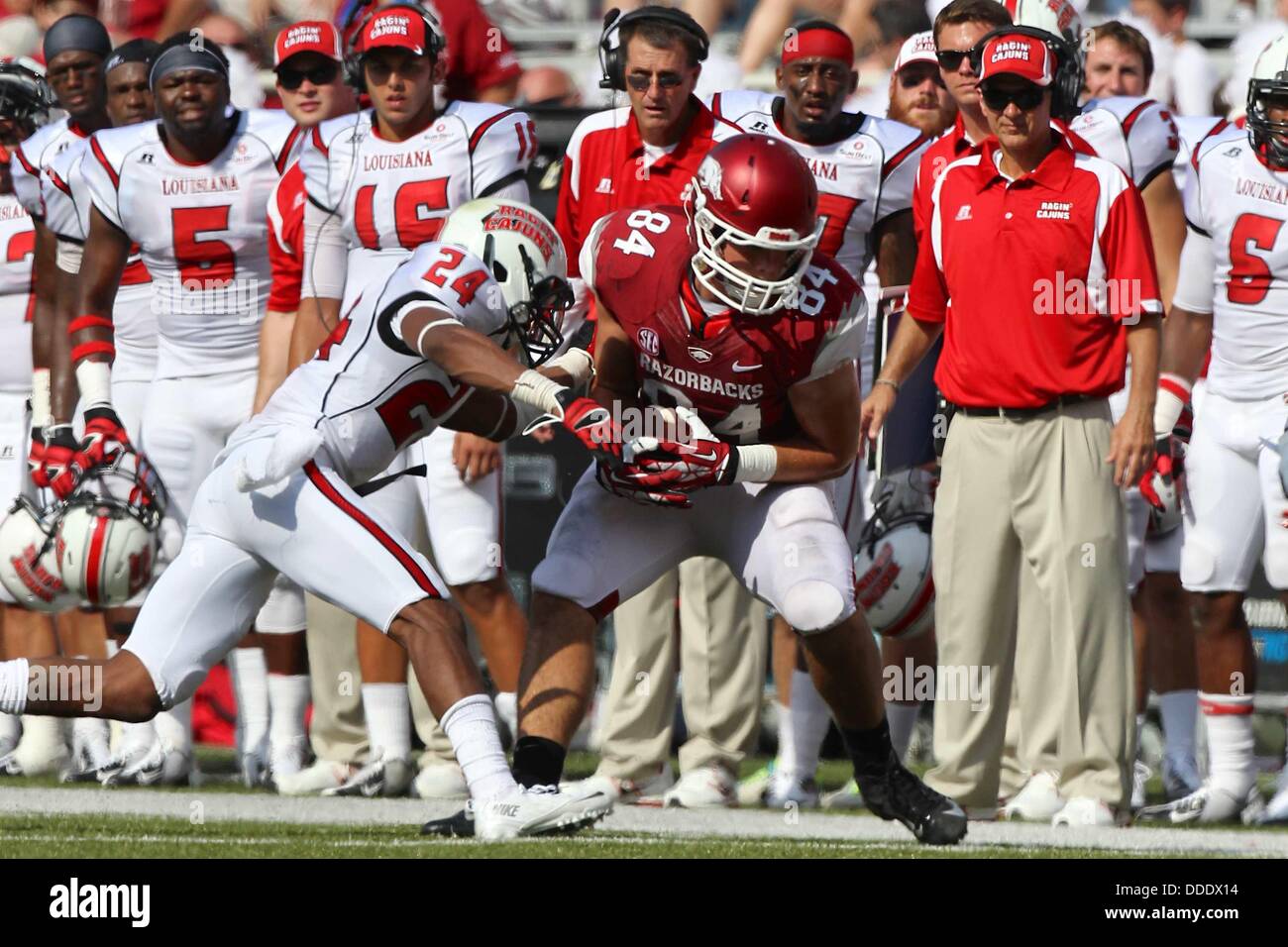 Aug 31, 2013: Razorback tight end Hunter Henry #84 attempts to escape ...