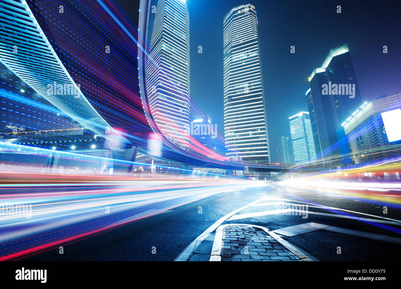 the light trails on the modern building background in shanghai china ...