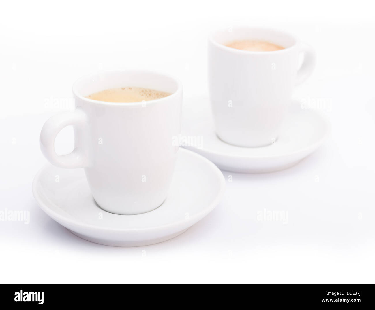 Two White Cups of Espresso Coffee on White Background - Shallow Depth ...