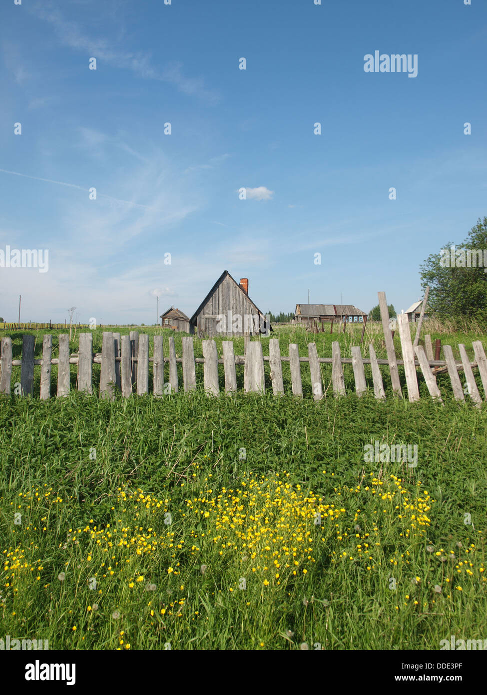 The old wooden house behind a fence. Russia Stock Photo - Alamy