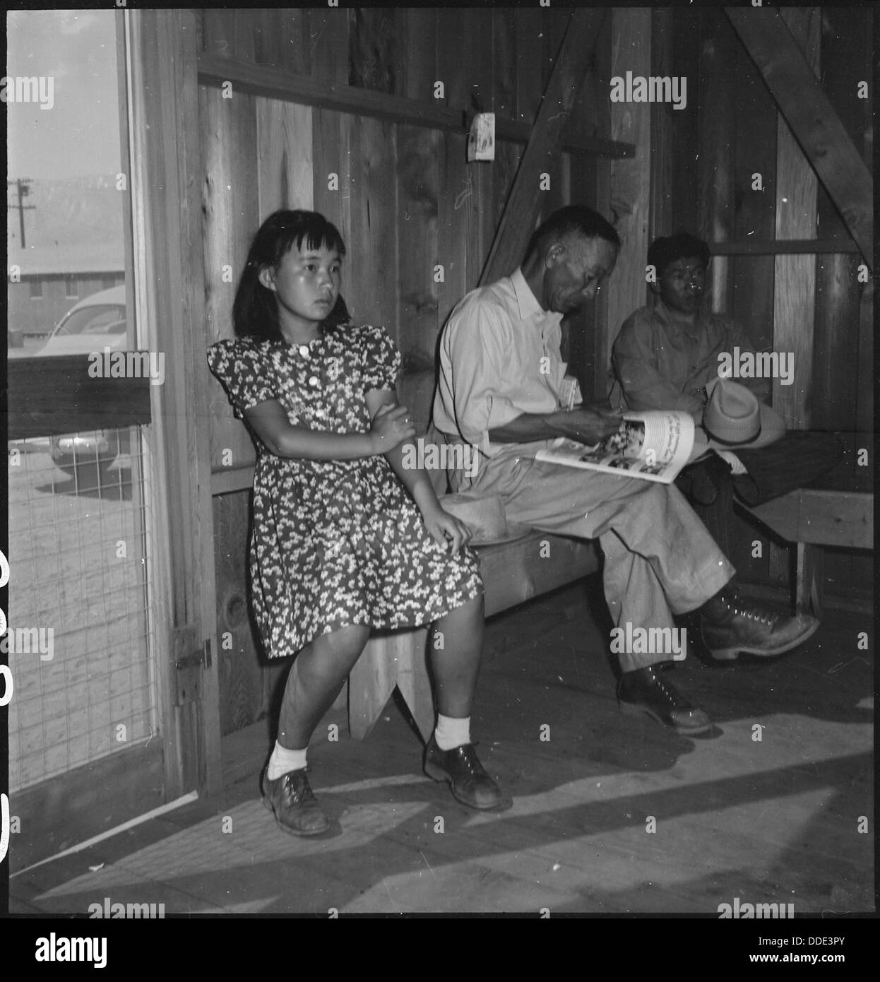 At the Manzanar Relocation Center in California, evacuees await their ...