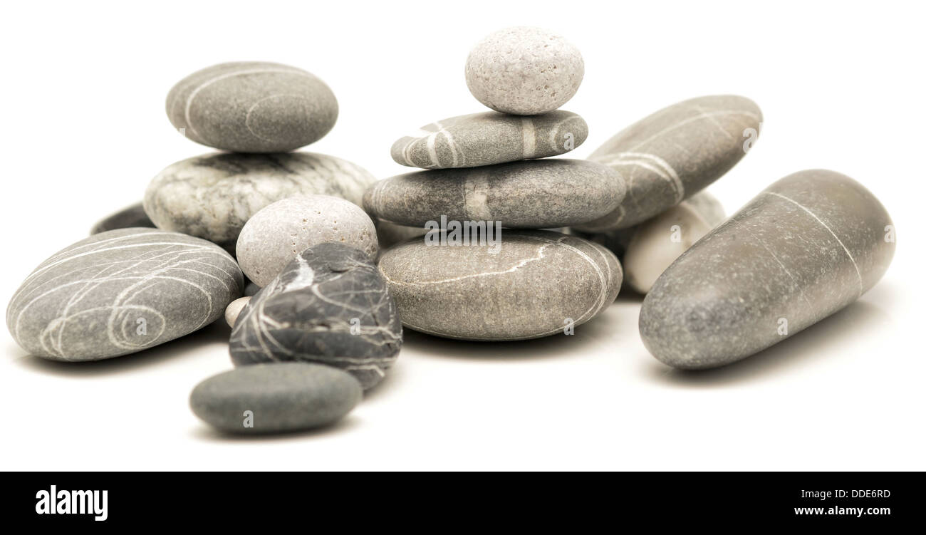 balancing pebbles isolated on white background Stock Photo - Alamy