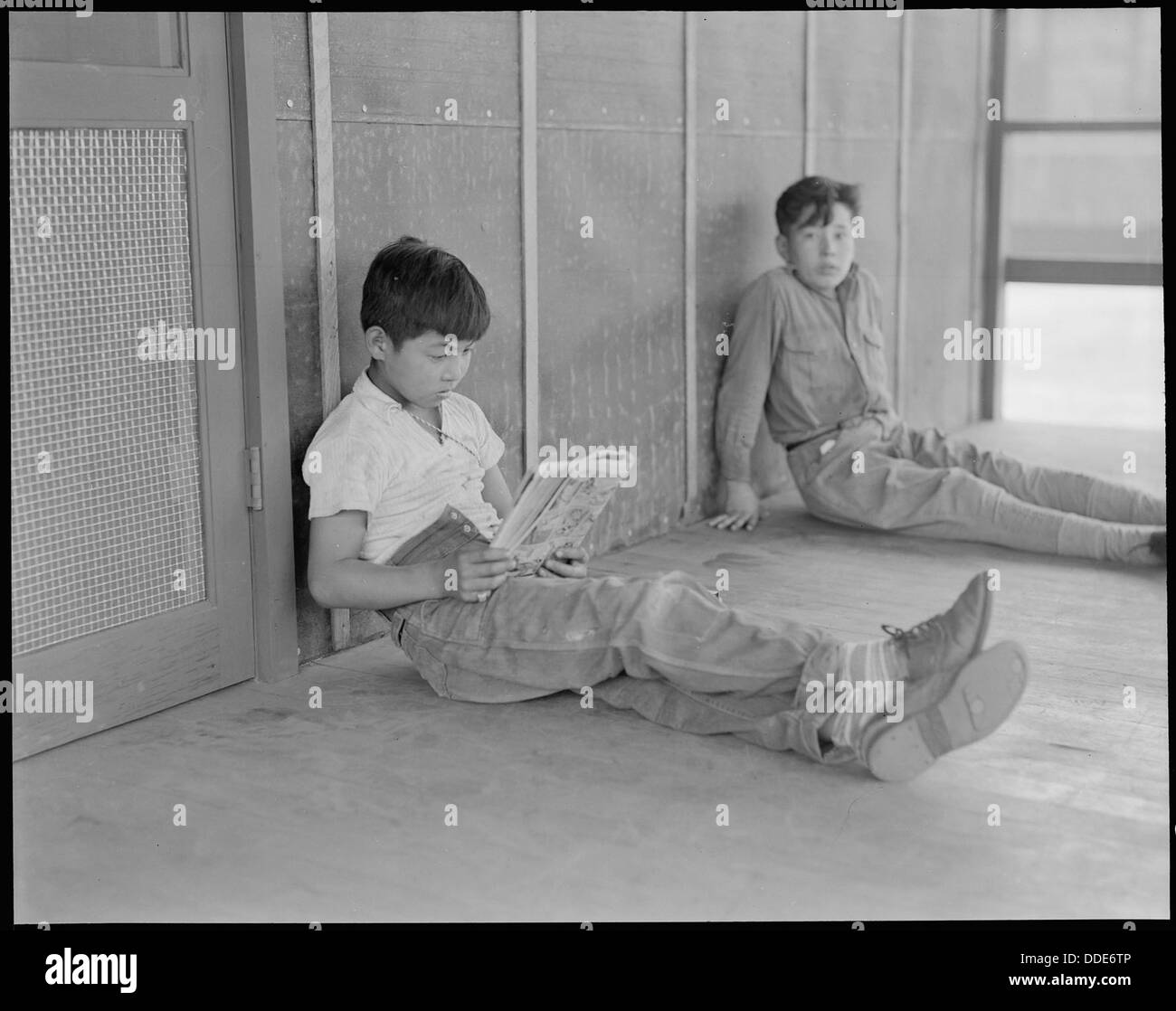 Two orphan boys from a group of 65 at the Manzanar Relocation Center in ...