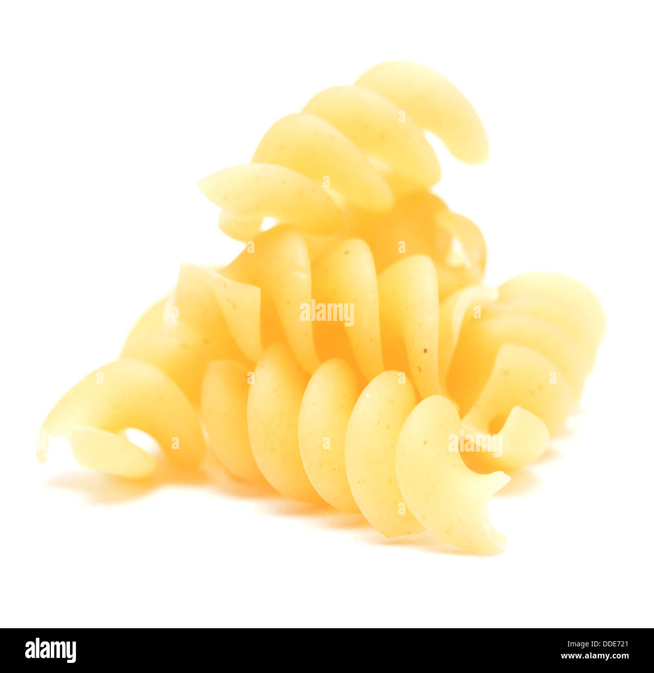 raw italian spiral pasta isolated on white background Stock Photo - Alamy