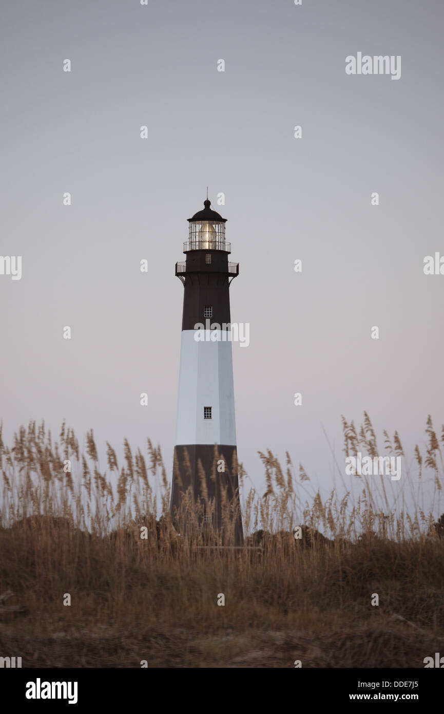 Lighthouse at sunrise, Tybee island, USA Stock Photo - Alamy