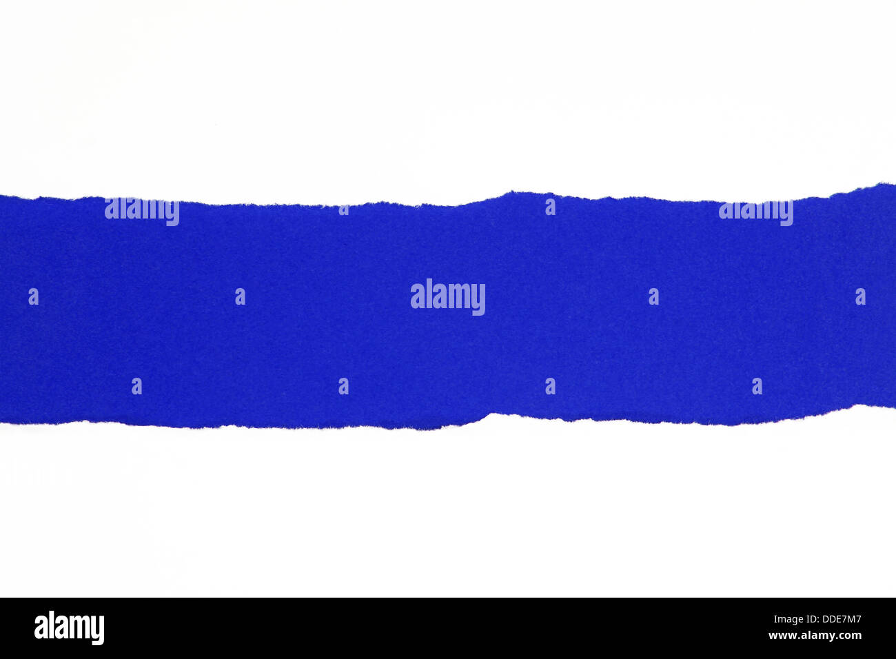 teared paper with blue copy space Stock Photo - Alamy