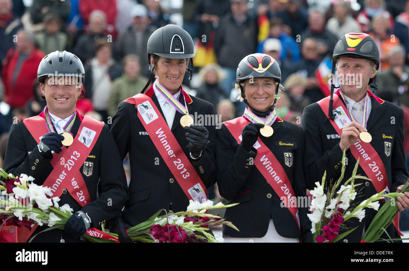 German eventers (L-R) Michael Jung, Dirk Schrade, Ingrid Klimke and ...