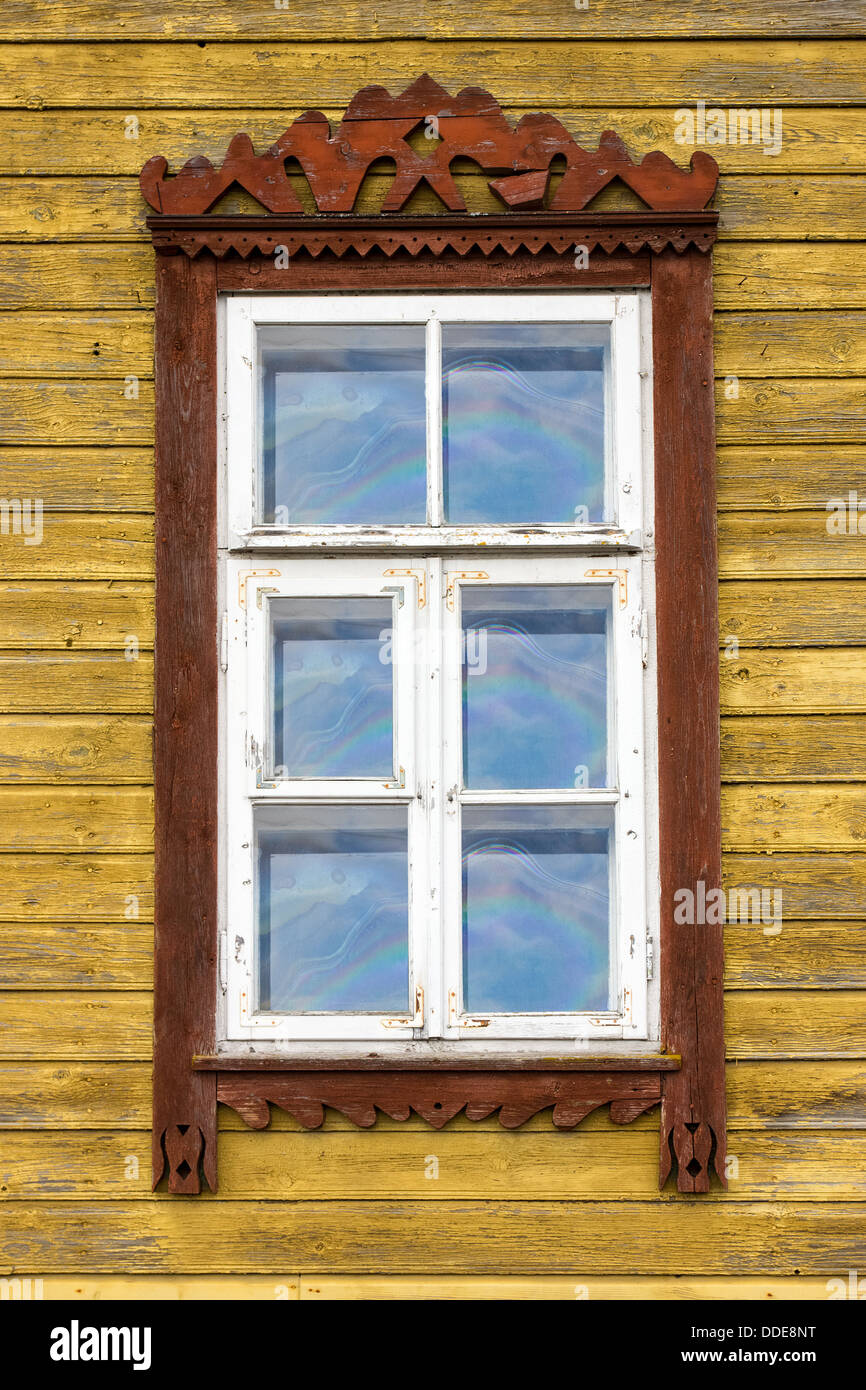 Window of old wooden yellow painted house Stock Photo - Alamy