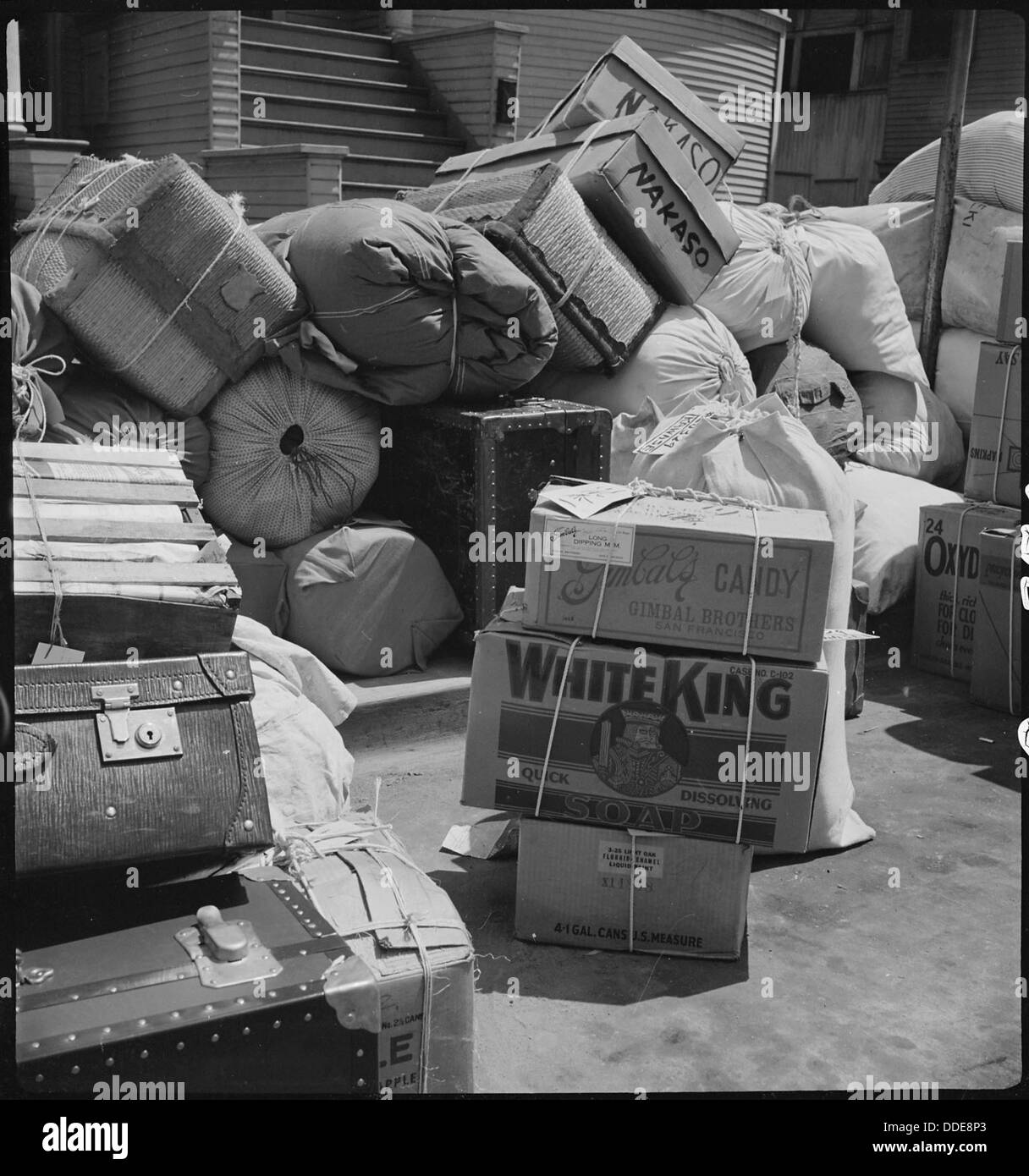 A family of Japanese ancestry waits at the Wartime Civil Control ...