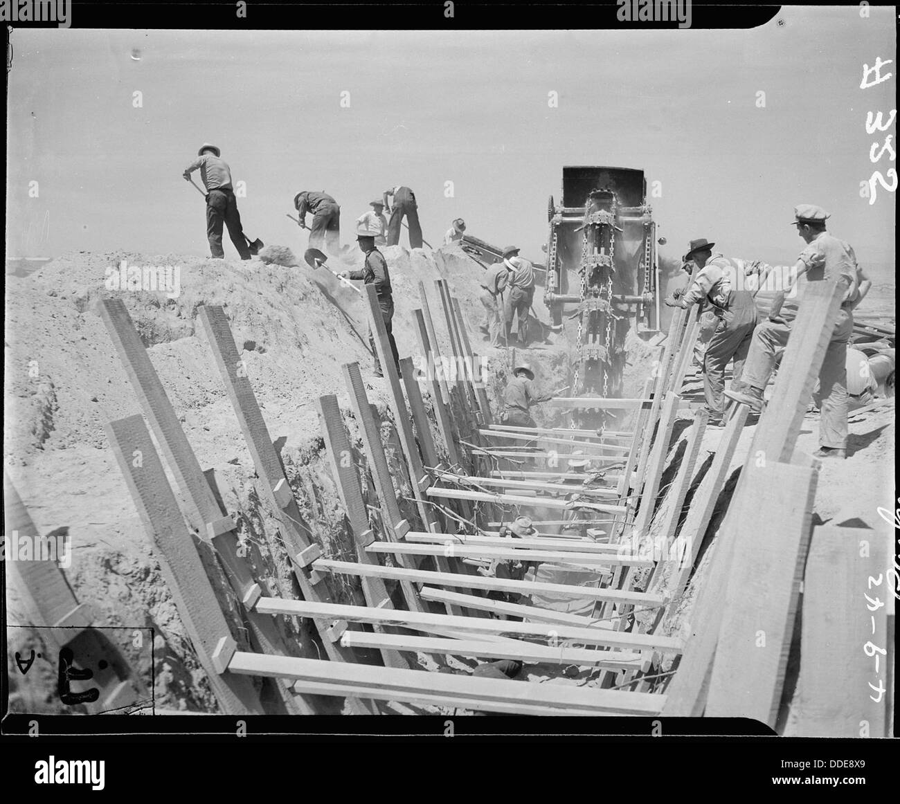 Digging a ditch old hi-res stock photography and images - Alamy