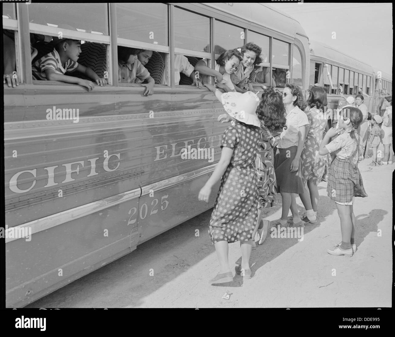 Evacuees of Japanese ancestry arrive at the Poston War Relocation ...