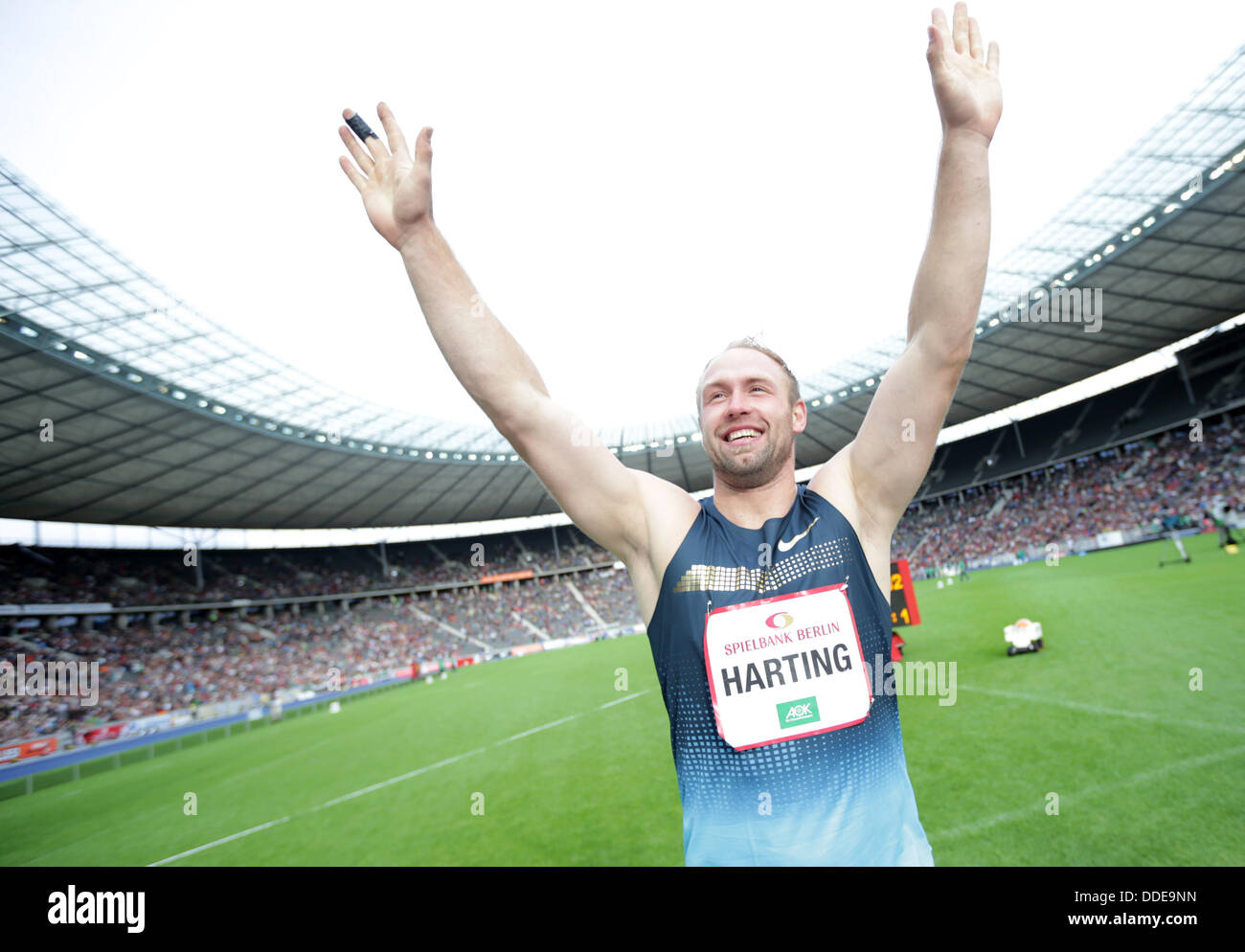 Germany's Robert Harting celebrates the victory in the discus throw ...