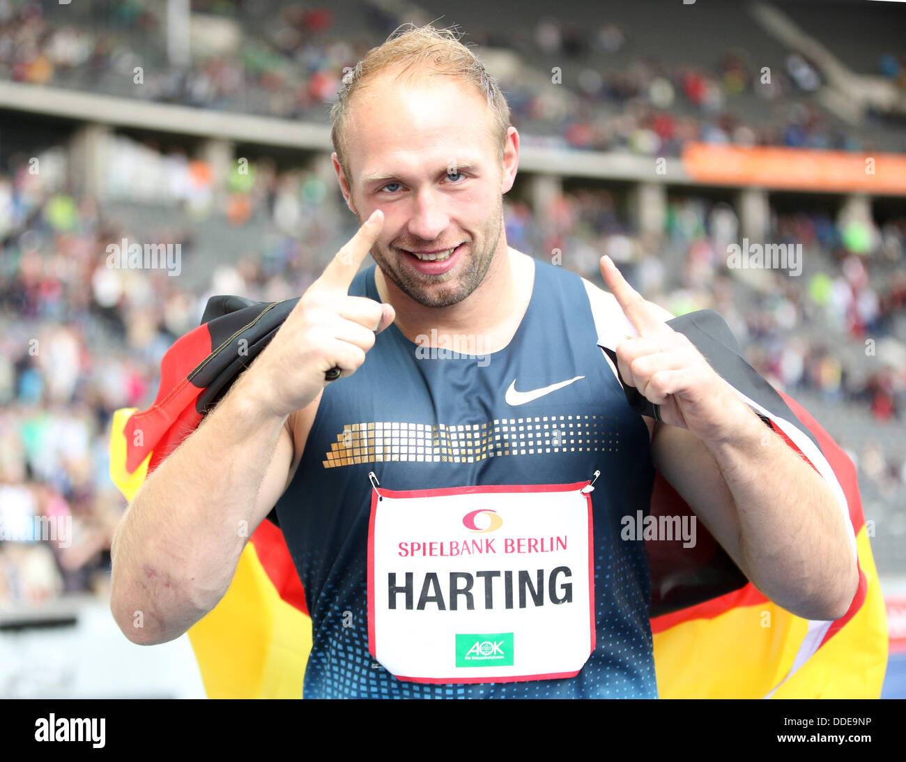 Germany's Robert Harting celebrates the victory in the discus throw ...