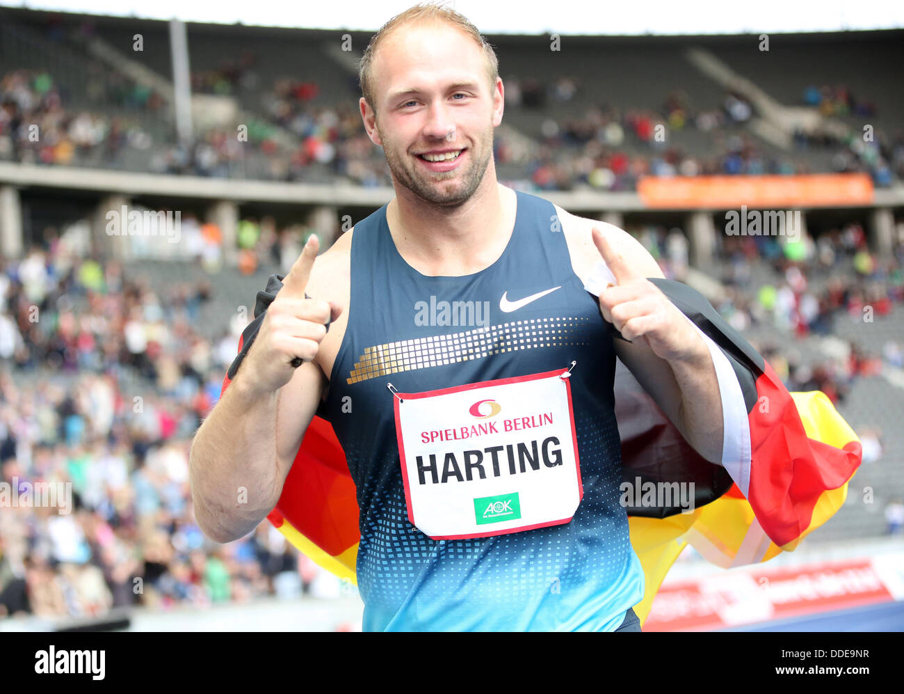 Germany's Robert Harting celebrates the victory in the discus throw ...