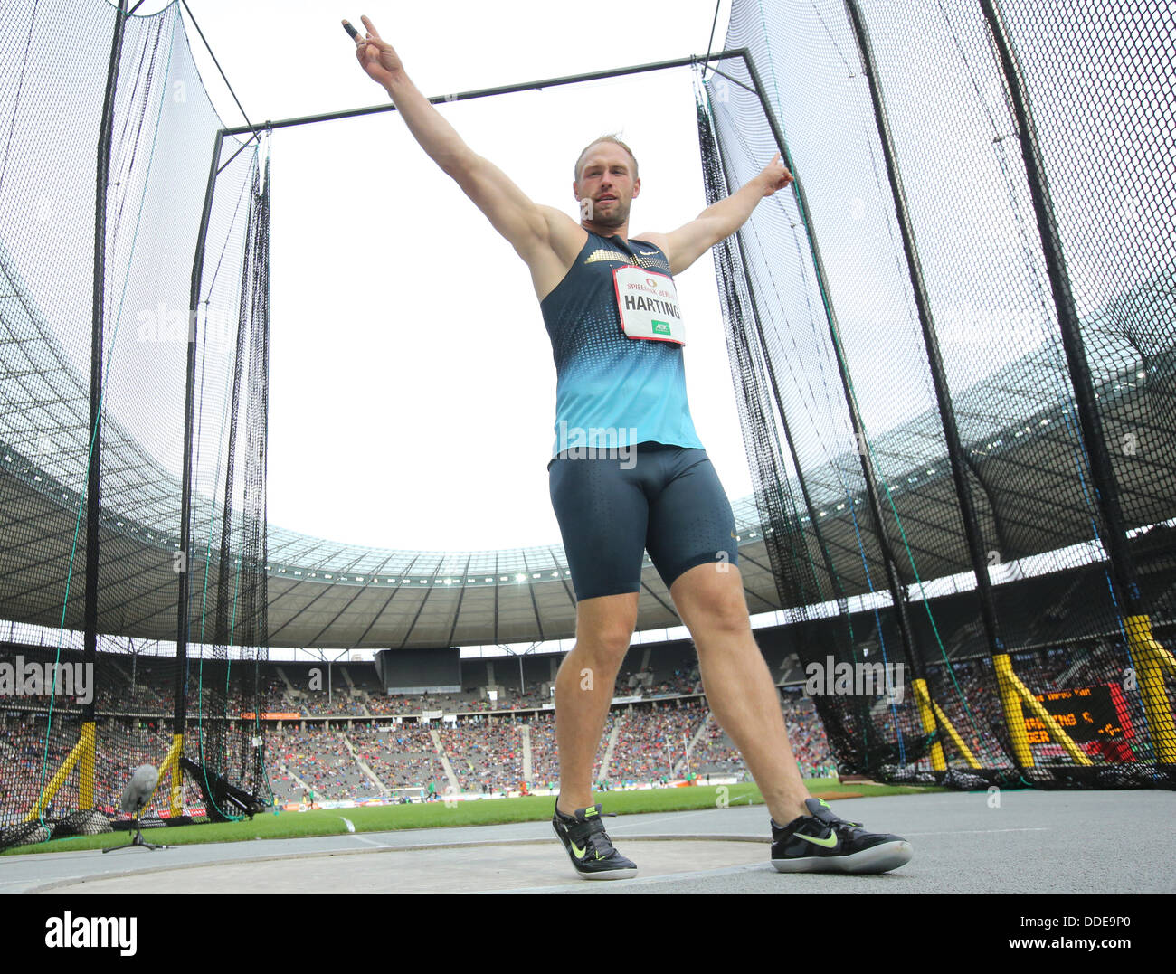 Germany's Robert Harting celebrates the victory in the discus throw ...