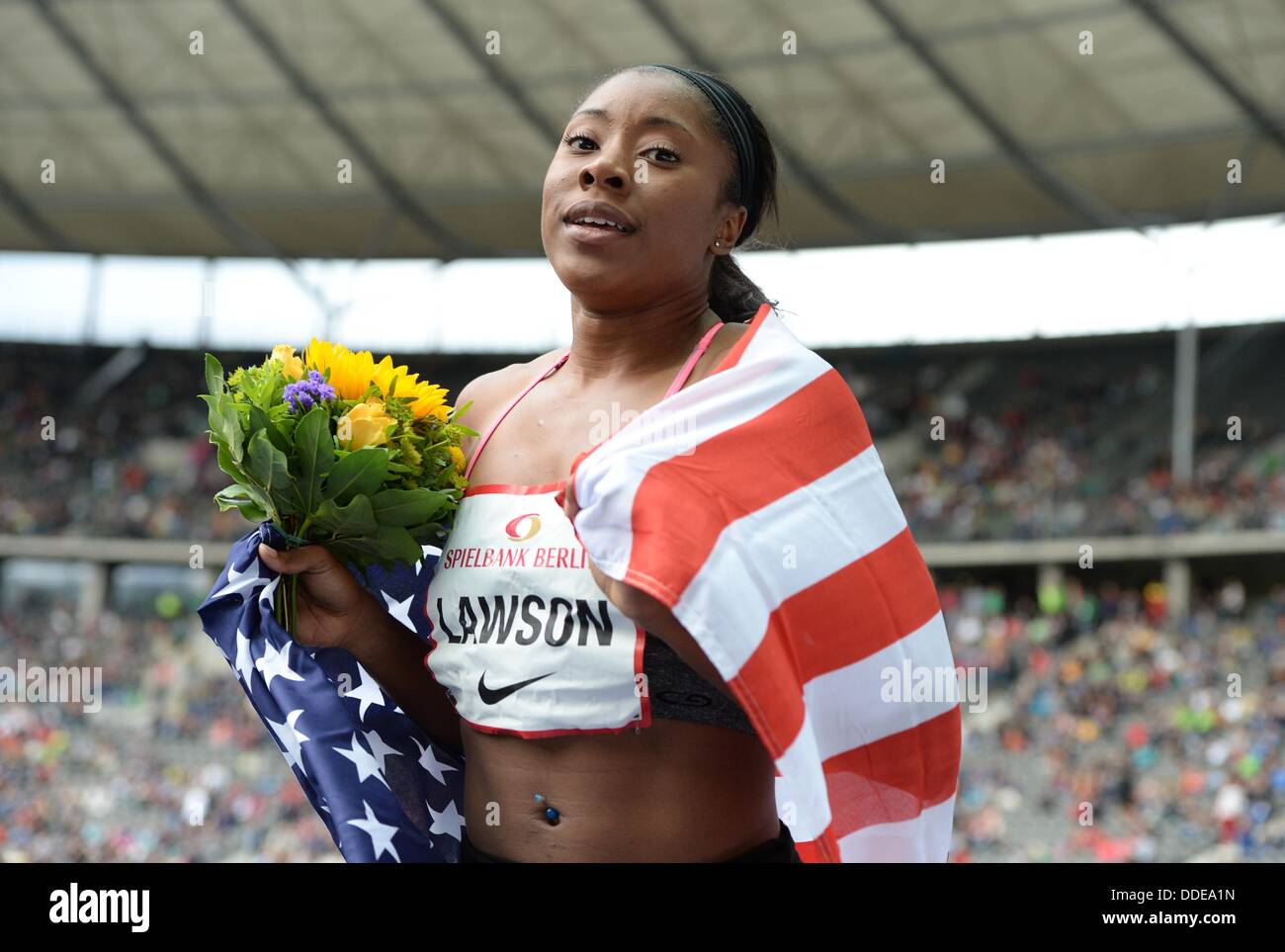 US sprinter Lakeisha Lawson celebrates her victory in the 100m race of ...