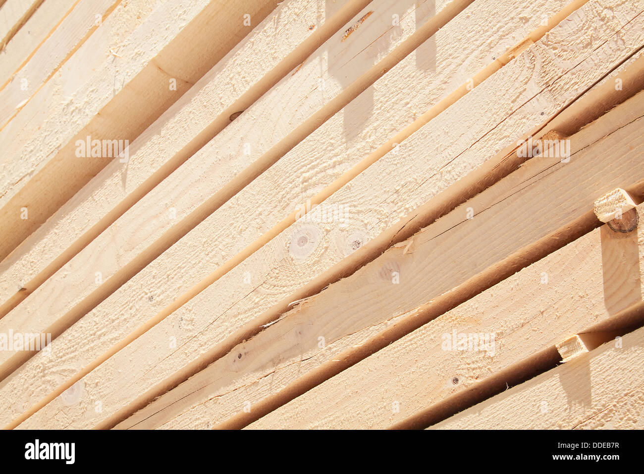Stack of new wooden studs at the lumber yard Stock Photo - Alamy